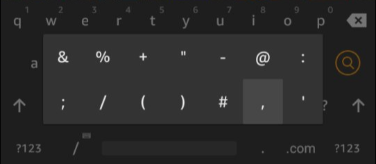 Where is the comma on the search keyboard?
